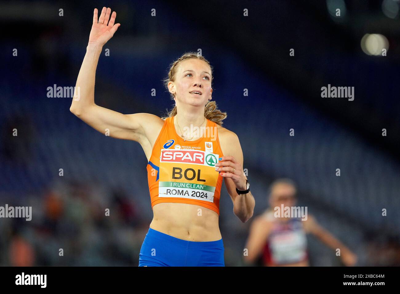 Femke Bol, of the Netherlands, crosses the finish line to win the women ...