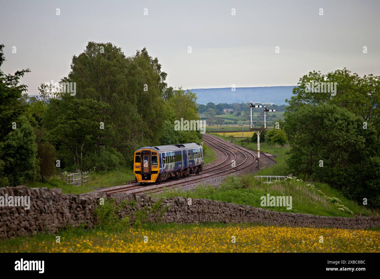 Northern Rail class 158 DMU train passing the midland railway bracket ...