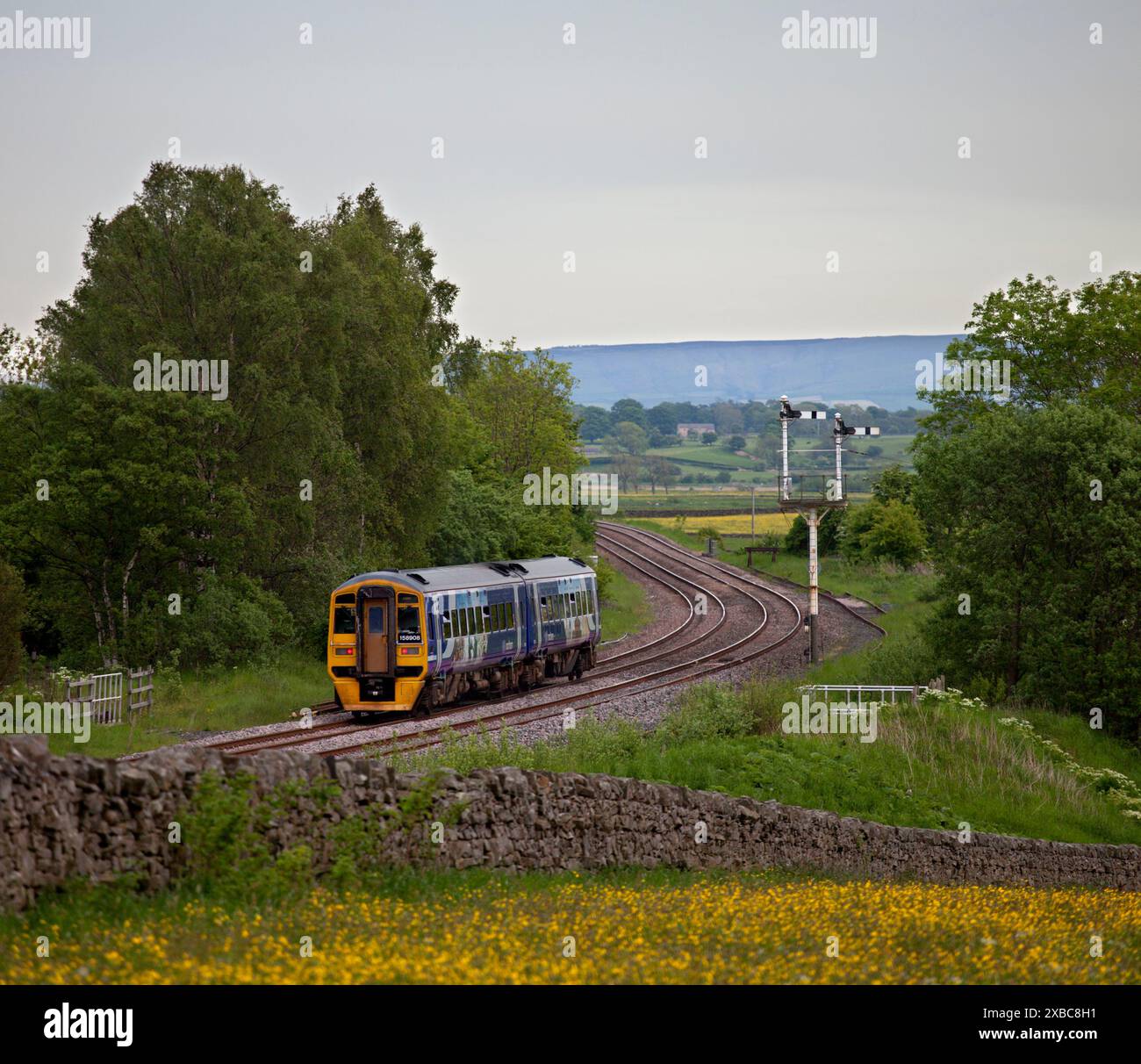 Northern Rail class 158 DMU train passing the midland railway bracket ...