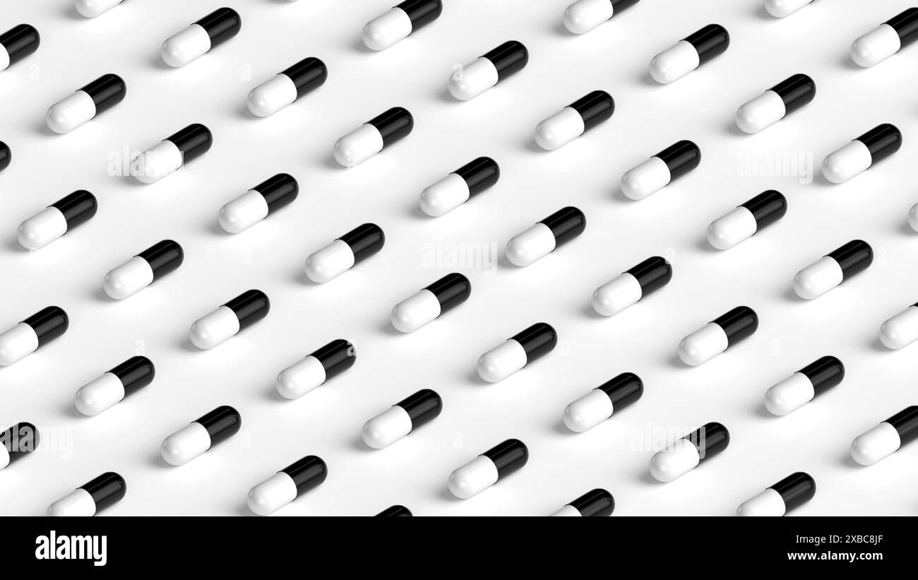 Many white black capsules on white background, tablet grid. Drug ...
