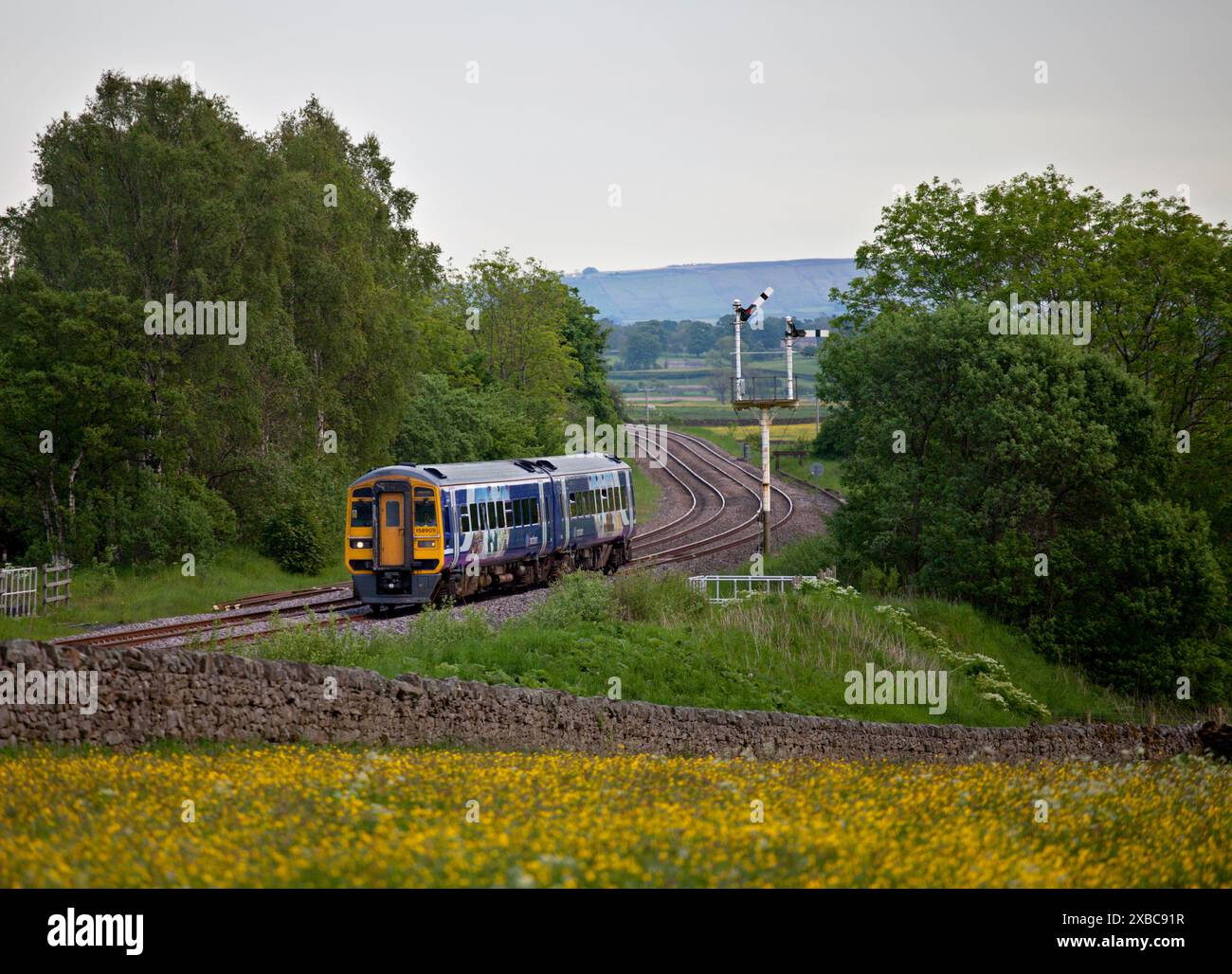 Northern Rail class 158 DMU train passing the midland railway bracket ...