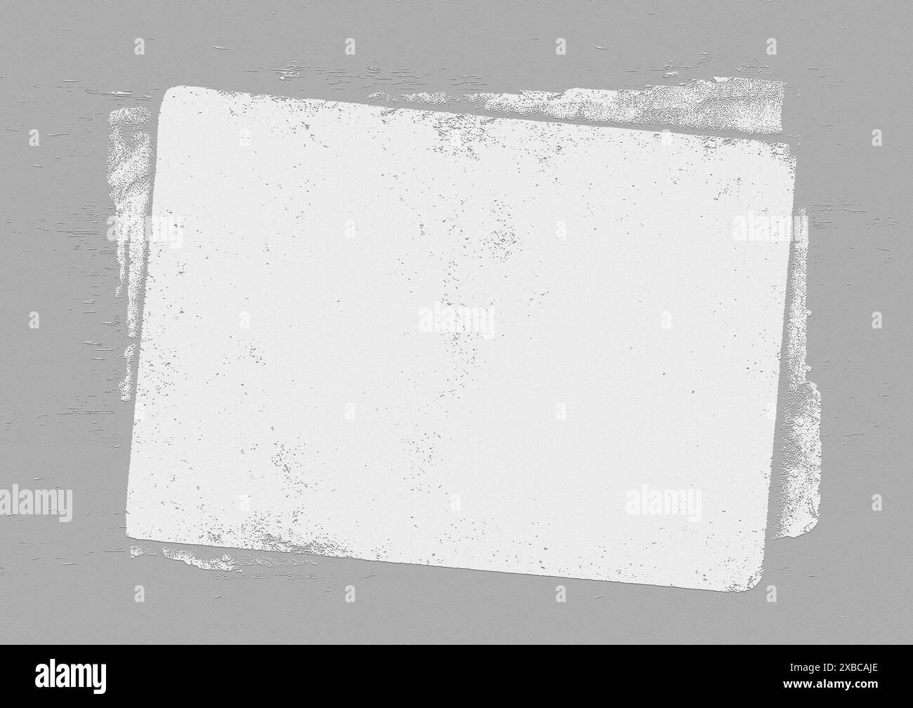 A blank vintage paper with a rough texture against a gray background ...