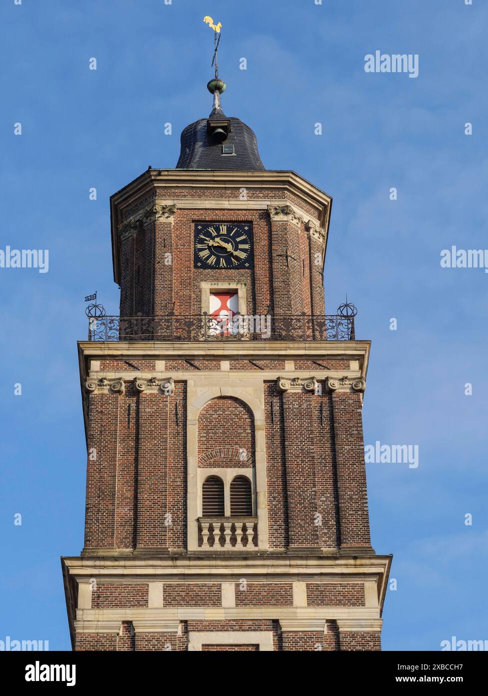 A detailed church tower with clock and decorative elements under a ...