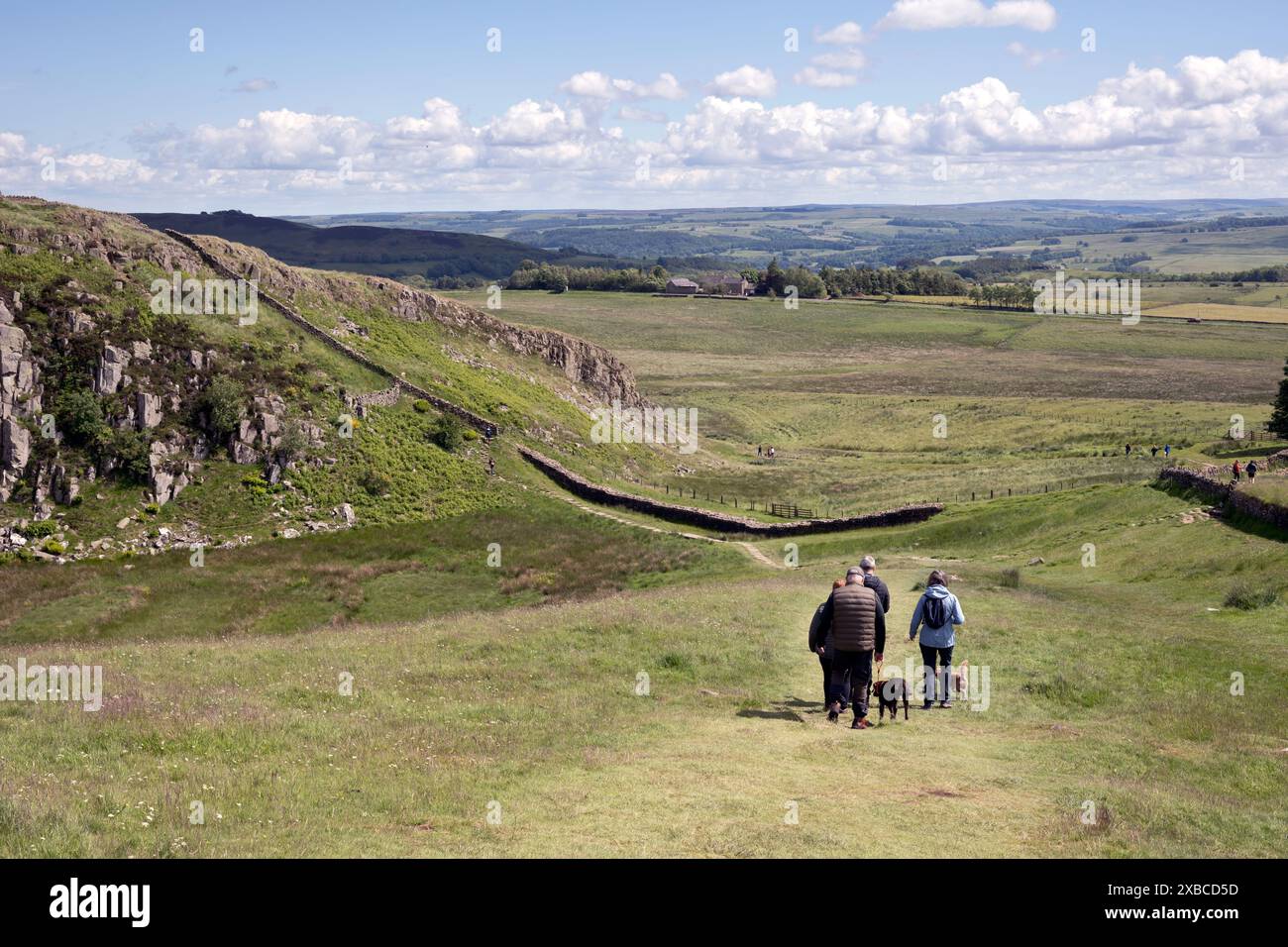 Walkers at Steel Rigg, Hadrian's Wall, near Bardon Mill, Northumberland ...