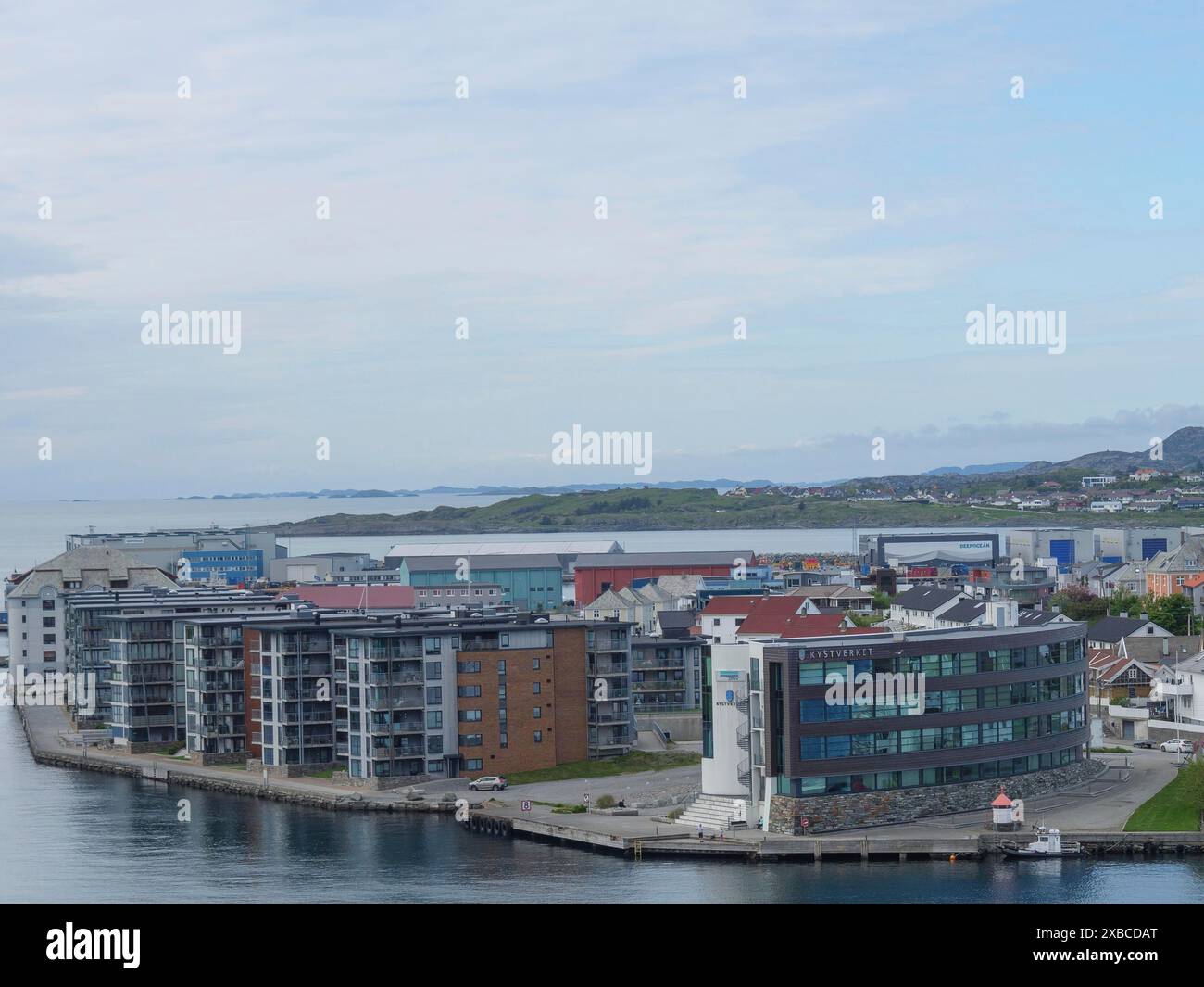 A modern harbour district with large apartment buildings on the ...
