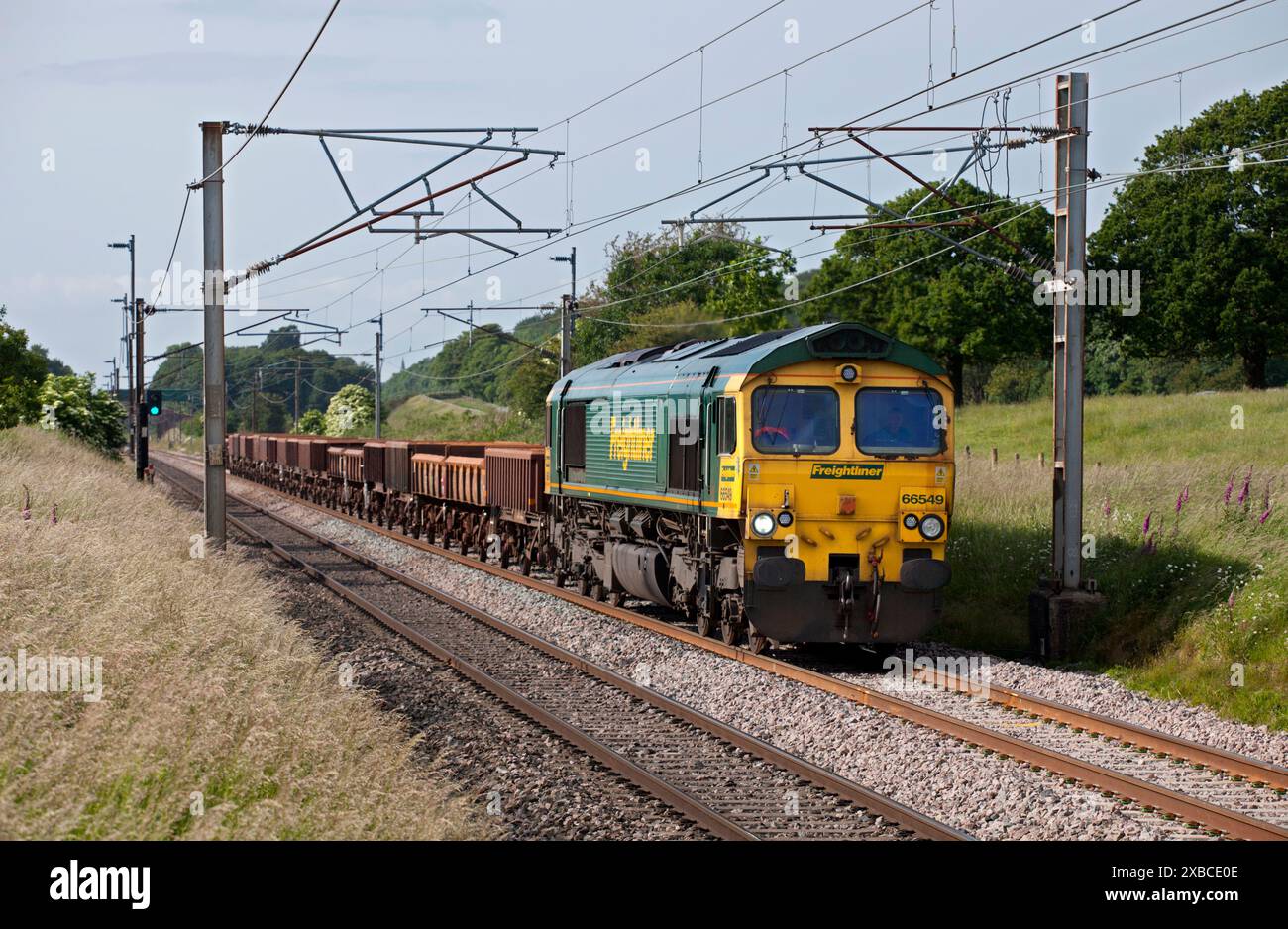 Freightliner class 66 diesel locomotive 66549 passing Scorton, on the ...