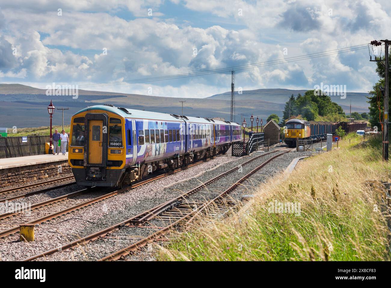 Northern Rail class 158 and Colas Rail Freight class 56 locomotive with ... Northern Rail class 158 and Colas Rail Freight class 56 locomotive with ...