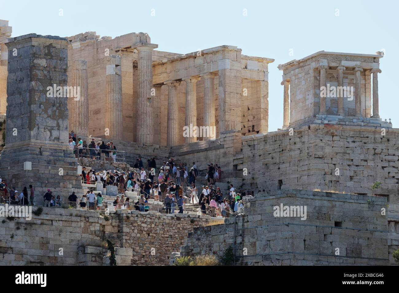 Propylaea and Temple of Athena Nike, tourists climbing the Grand Staircase, Acropolis, Athens ...