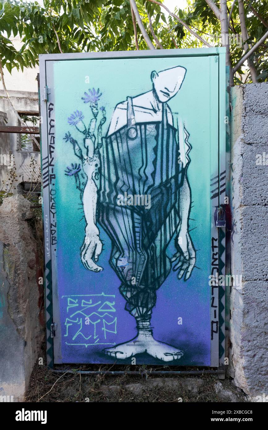 Bizarre figure in gardener's overalls, street art in the Anafiotika ...