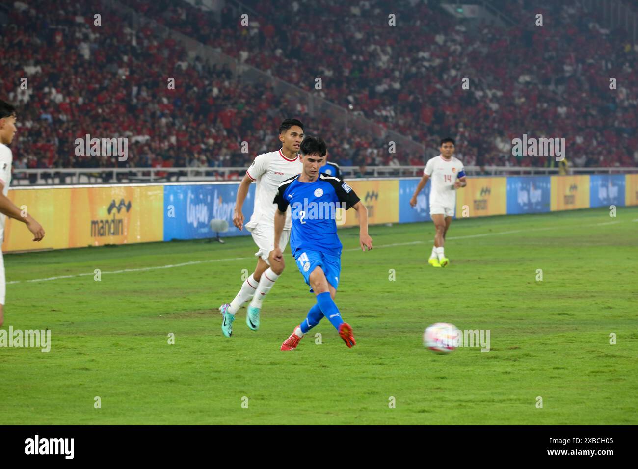 Jakarta, Indonesia, 11 June 2024 ALEX MONIS/SCOTT WOODS dribbling ball ...