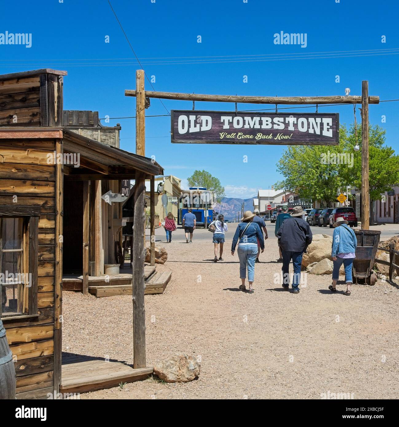 Rustic wood gateway sign greeting tourists departing Old Tombstone ...