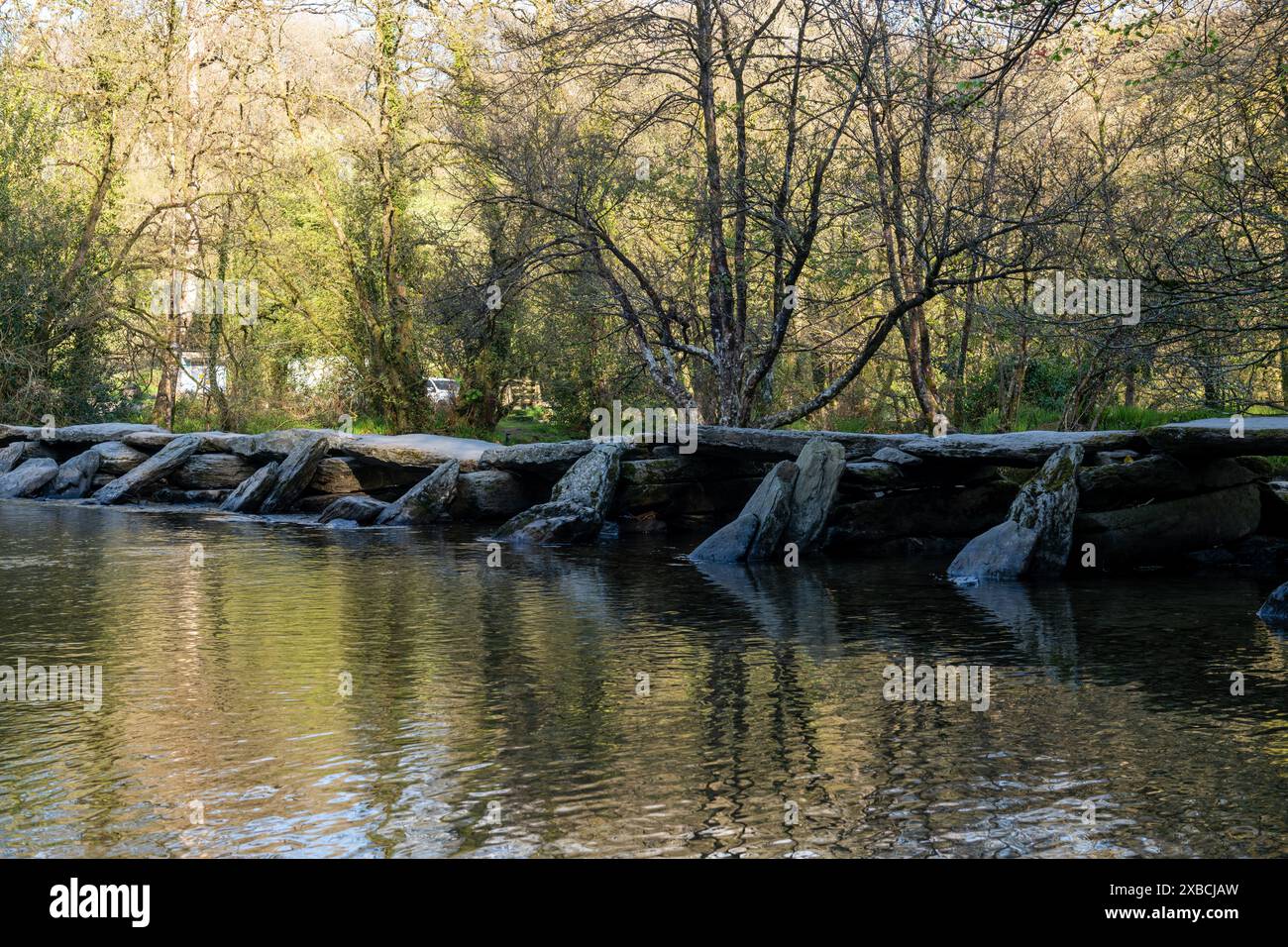Photograph of the clapper bridge at Tarr steps in Exmoor National Park ...