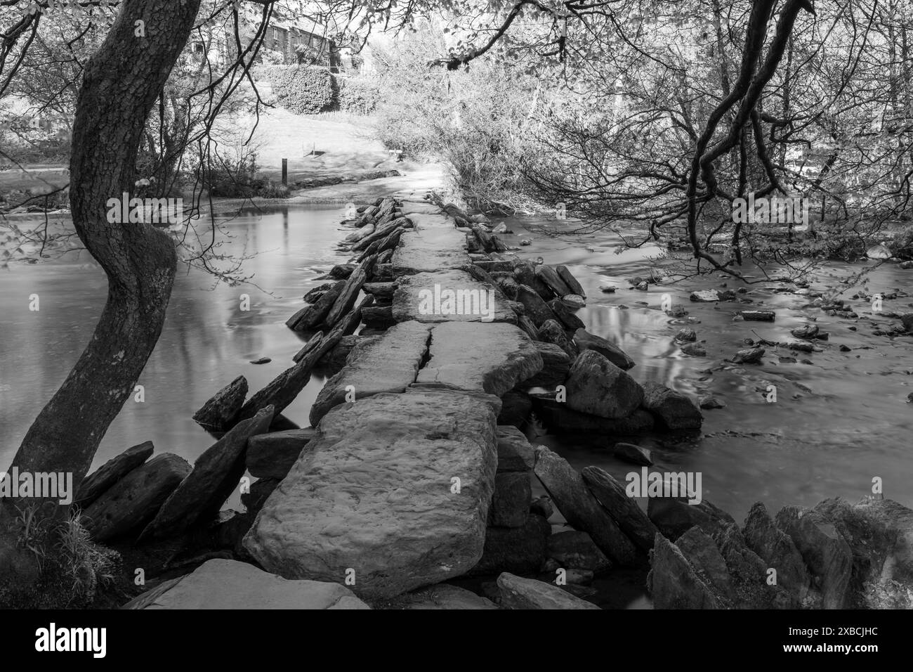 Photograph of the clapper bridge at Tarr steps in Exmoor national Park ...