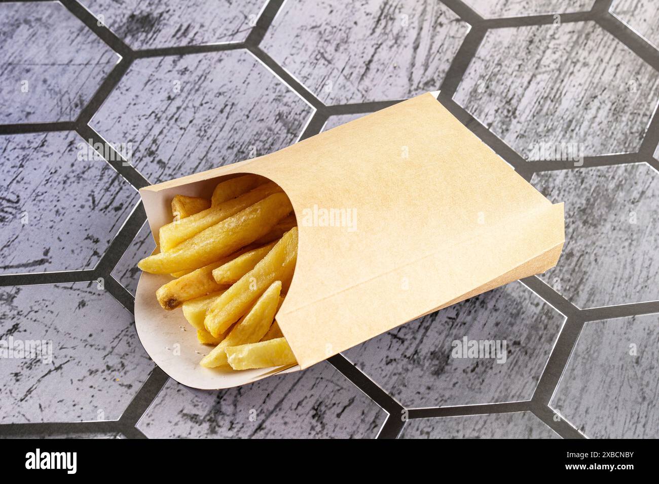 Crispy salted French fry potato snack Stock Photo - Alamy
