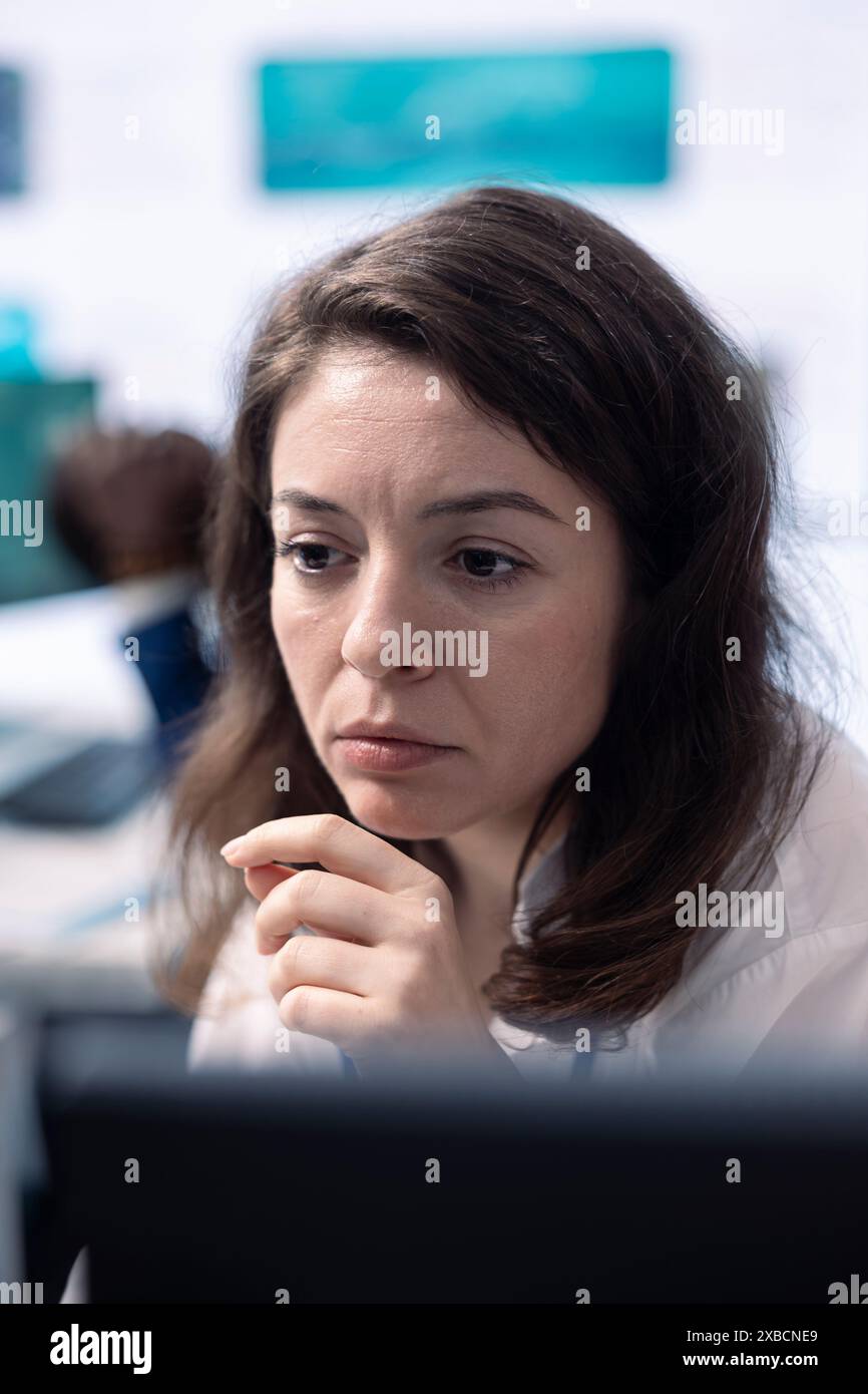 Company employee establishing project details and essential information ...