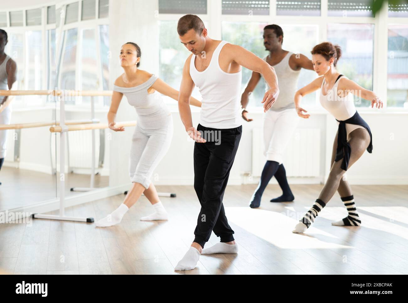 Group of dancers rehearsing ballet dance Stock Photo - Alamy