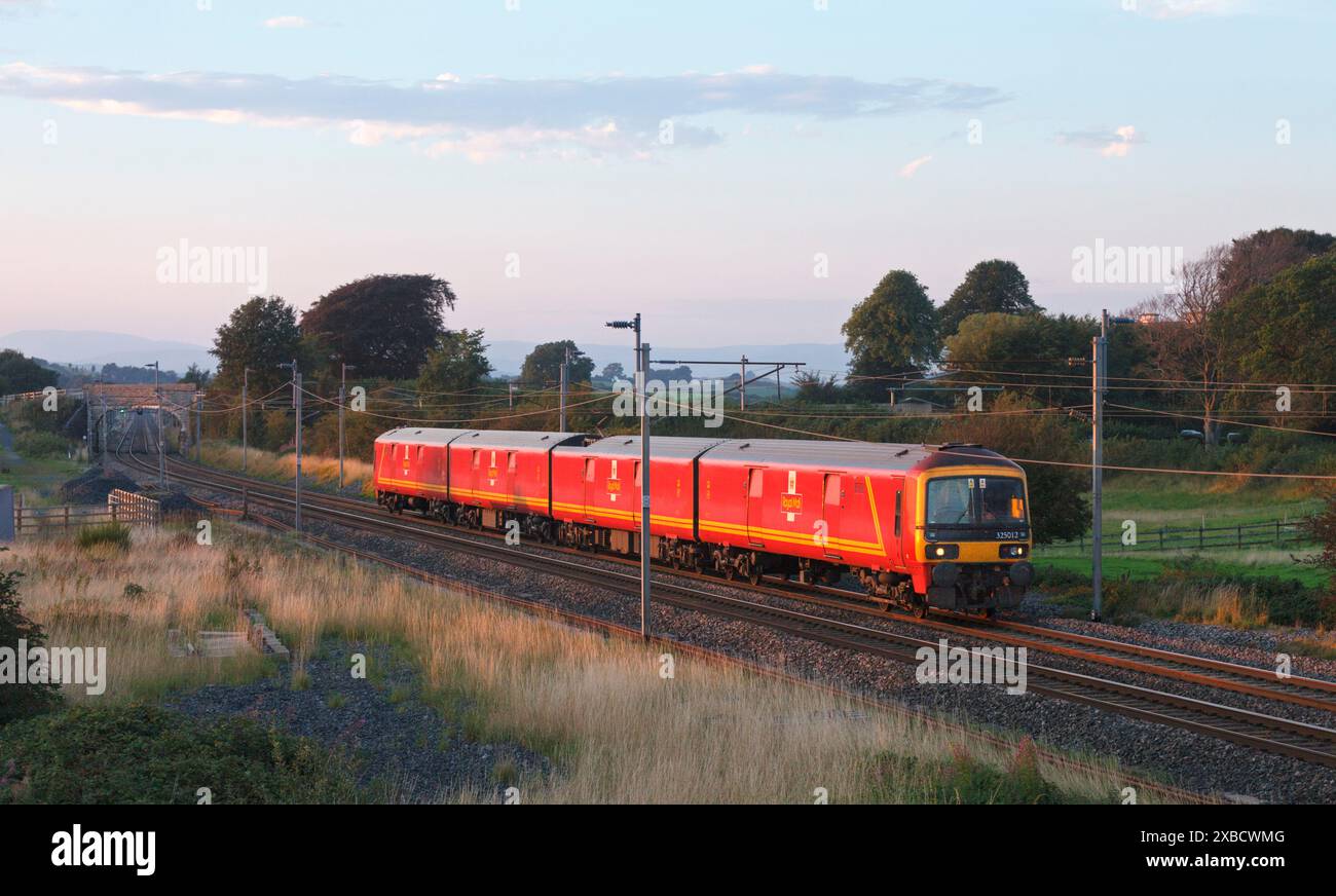 DB cargo operated Royal Mail class 325 postal train on the west coast ...