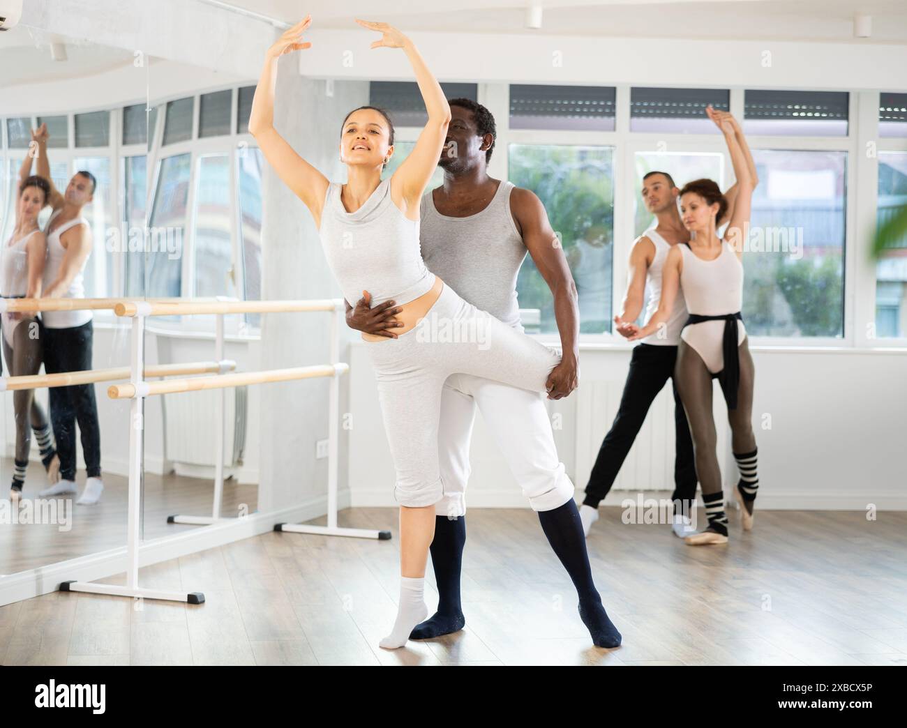Man and woman dancing couples ballet dance together Stock Photo - Alamy