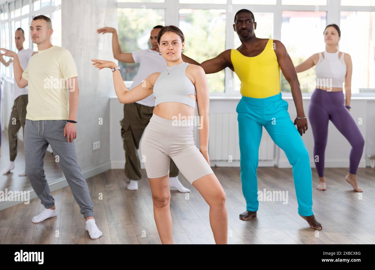 Group of people dancing modern dances Stock Photo - Alamy