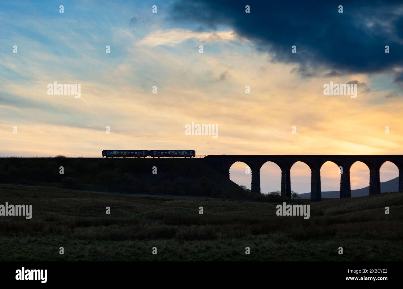An Arriva Northern Rail class 158 sprinter train crossing Ribblehead ...