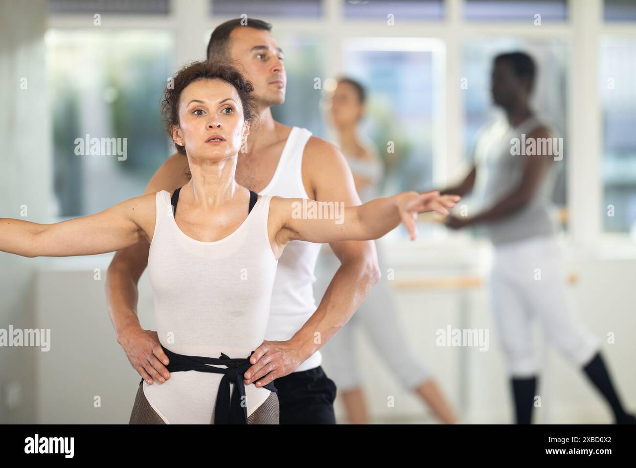 Ballet partners mastering paired technique during group class Stock ...