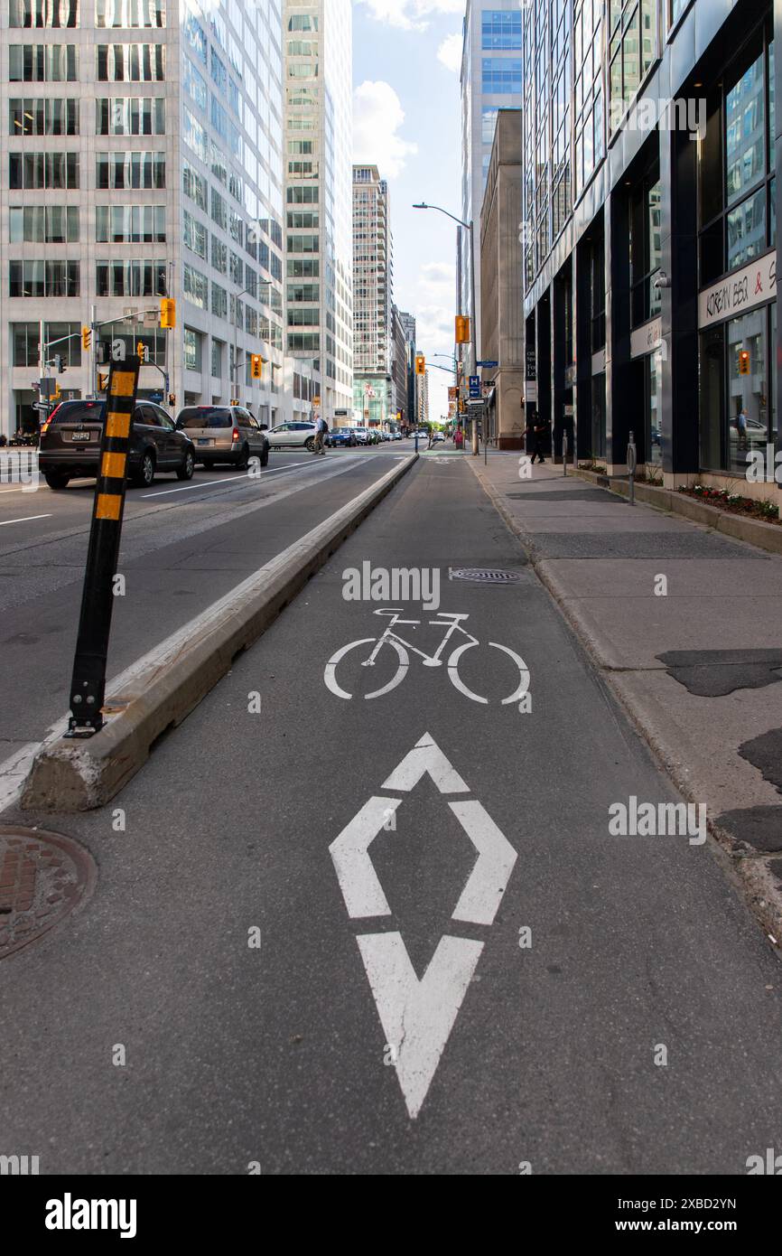 Ottawa, Canada - June 4, 2024: Bicycle lane on the street in downtown ...