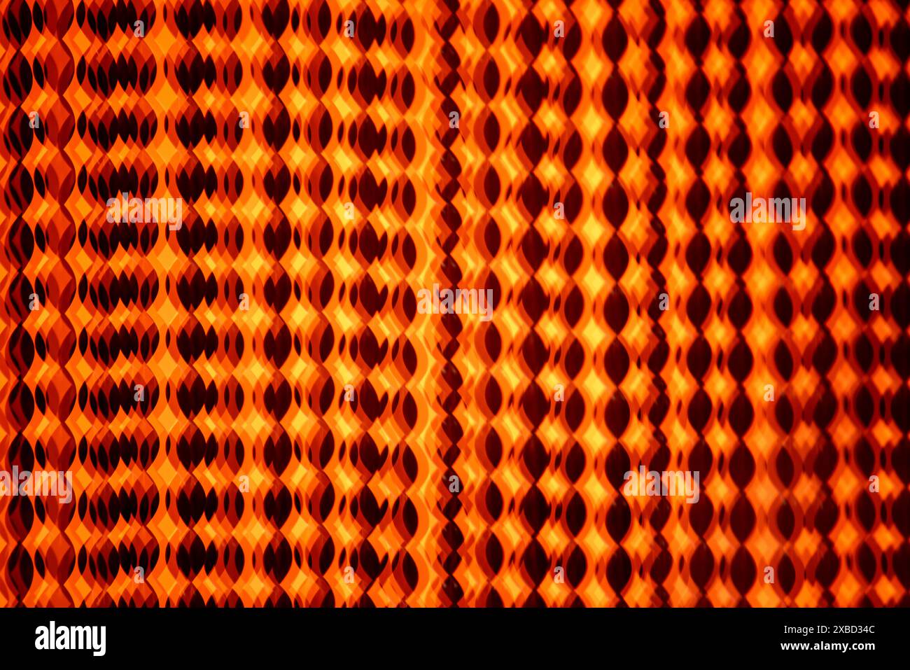 Abstract geometric pattern with intricate shapes in vibrant orange ...