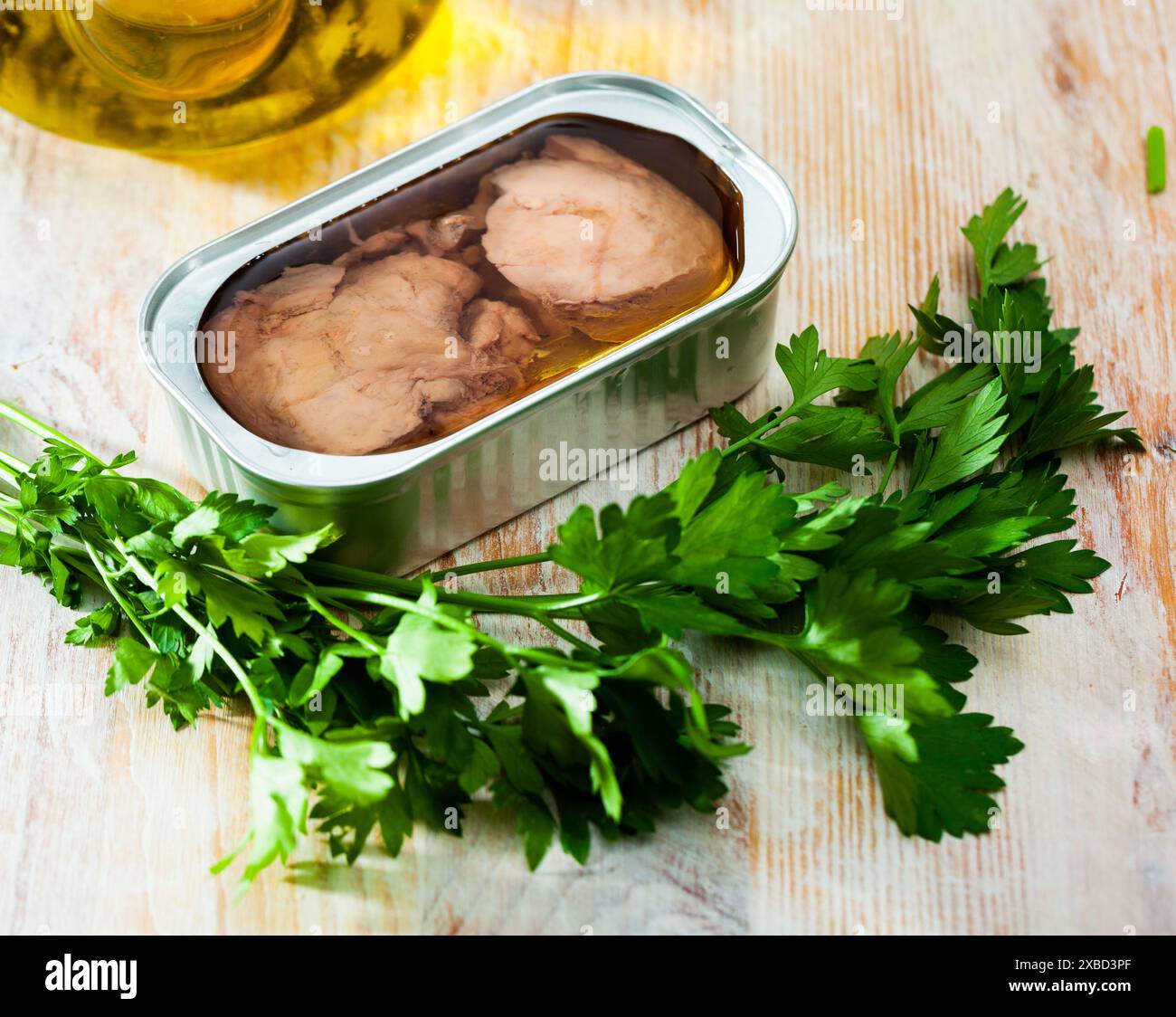 Smoked cod liver in oil with fresh greens Stock Photo - Alamy