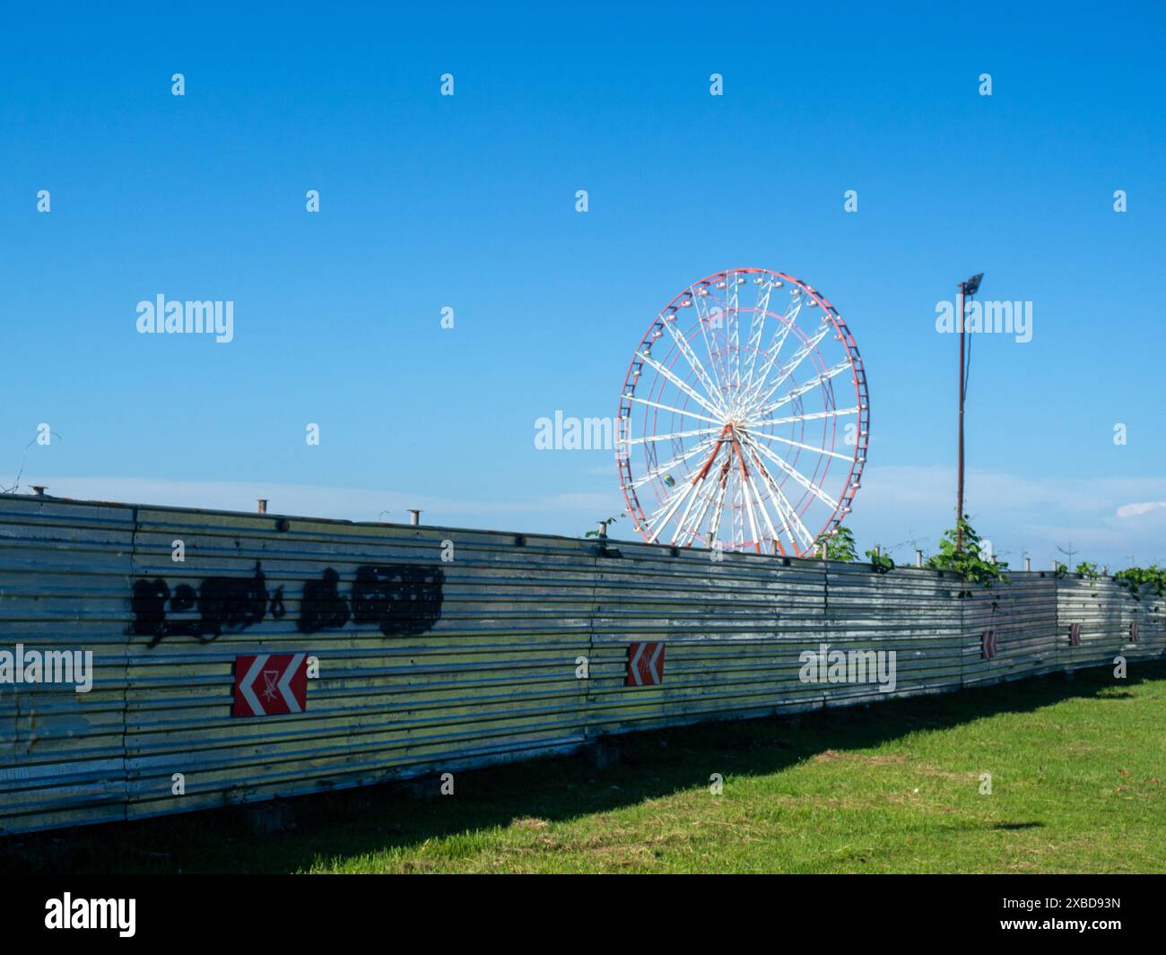 Ferris wheel at the resort. View of the embankment. Batumi Ferris Wheel ...