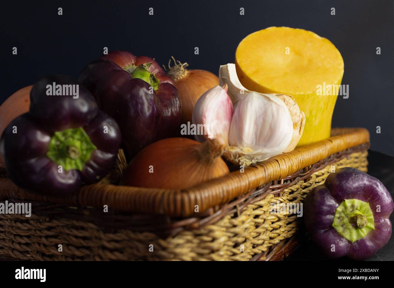 Fresh vegetables in a rustic basket with dark background Stock Photo ...