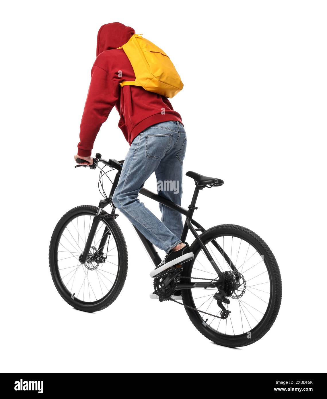 Man with backpack riding bicycle on white background Stock Photo - Alamy