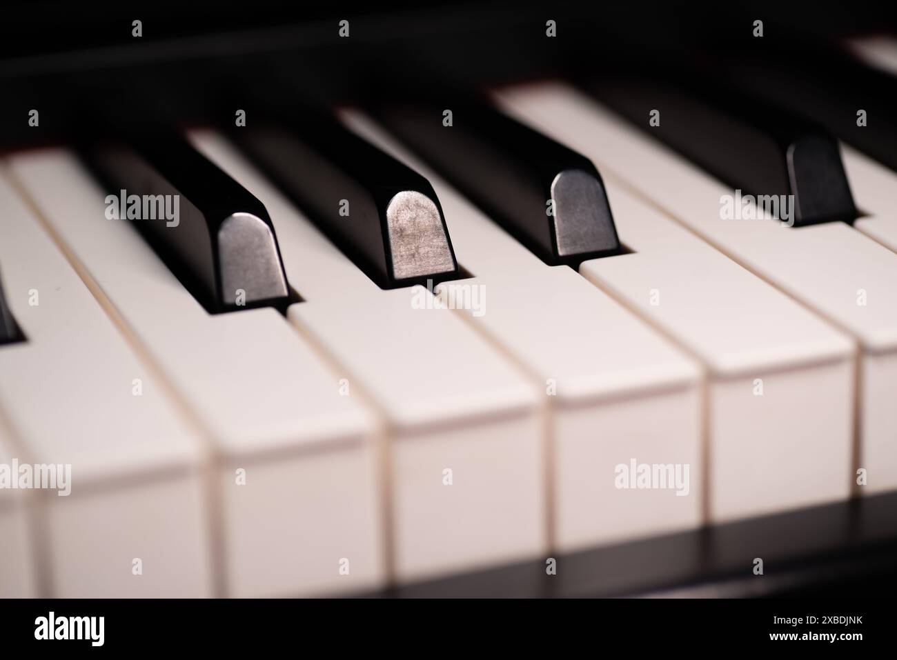 Jazz Piano Keys. Close-up of piano keys, focused on one note, with ...