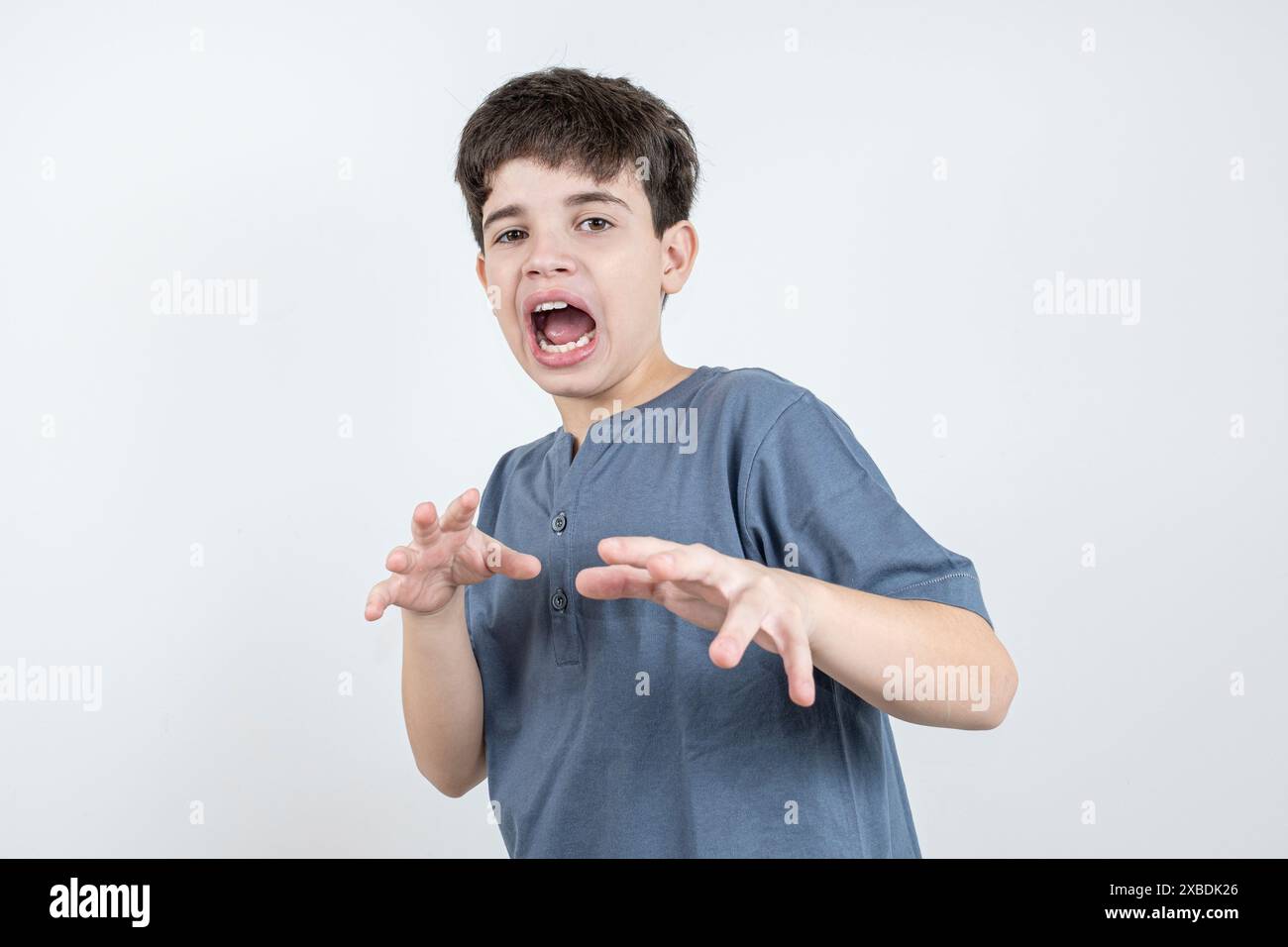 10 year old Brazilian boy scared and staring at the camera 1 Stock Photo - Alamy