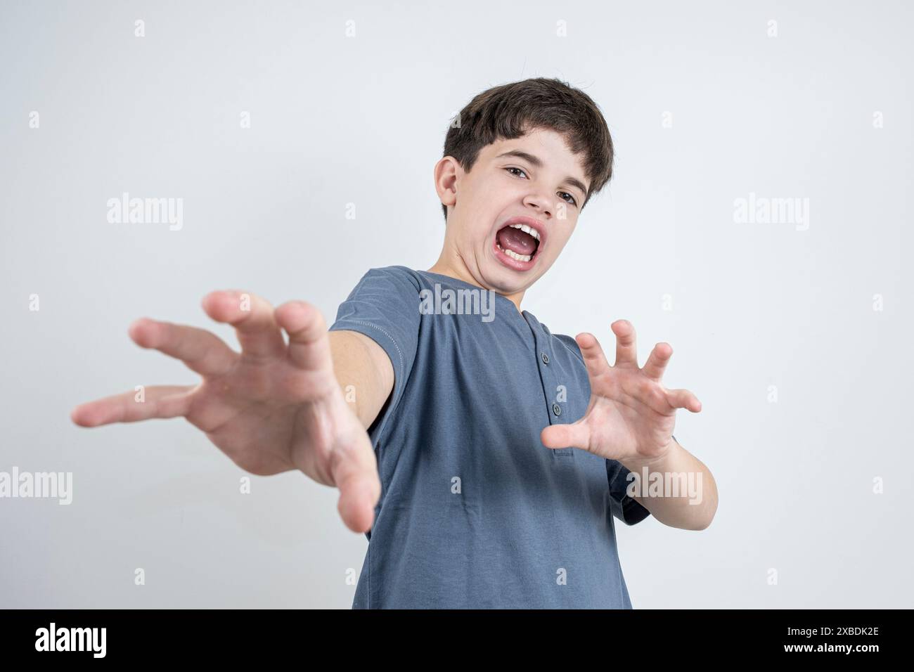 10 year old Brazilian boy scared and staring at the camera 3 Stock ...