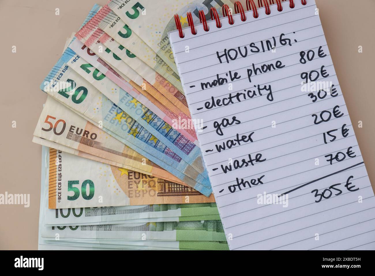 Counting receipt for utilities payment. Euro cash money bill ...