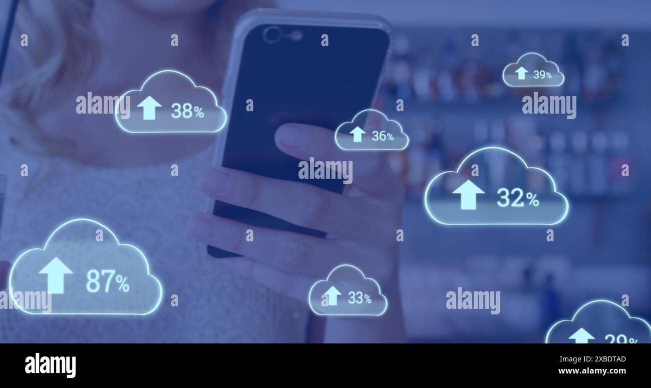 Image of cloud icons with growing numbers over caucasian woman using ...