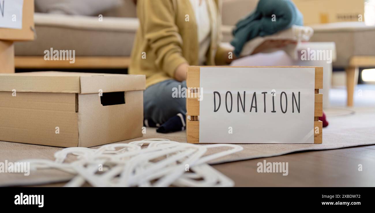 Volunteer Collecting and Donation Clothes for Charity. Community ...