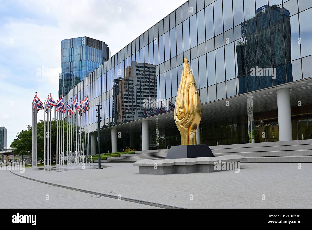 The Queen Sirikit National Convention Center (QSNCC) and its distinctive flame finial sculpture ...
