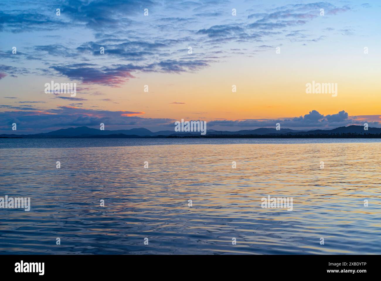 caribbean sunset viewed from coast across port of naguabo puerto rico ...