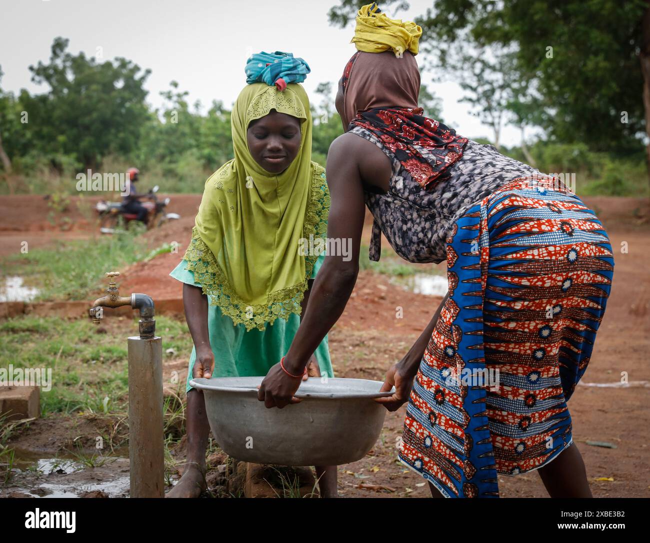 Parakou, Benin. 25th May, 2024. Villagers fetch water from a water ...