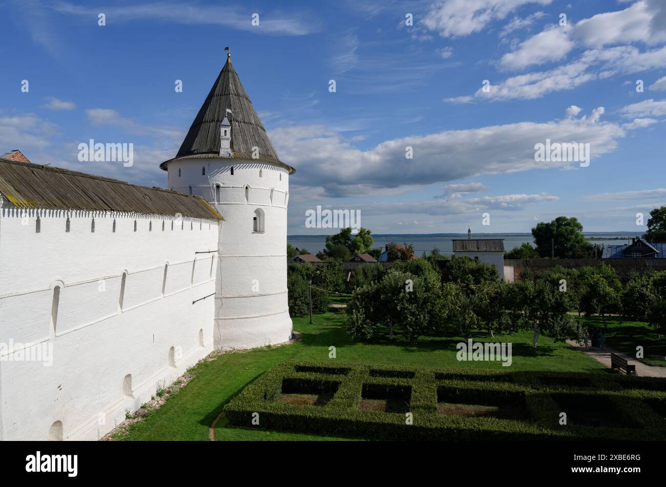 View of Lake Nero and medieval tower and wall around the Prince's ...