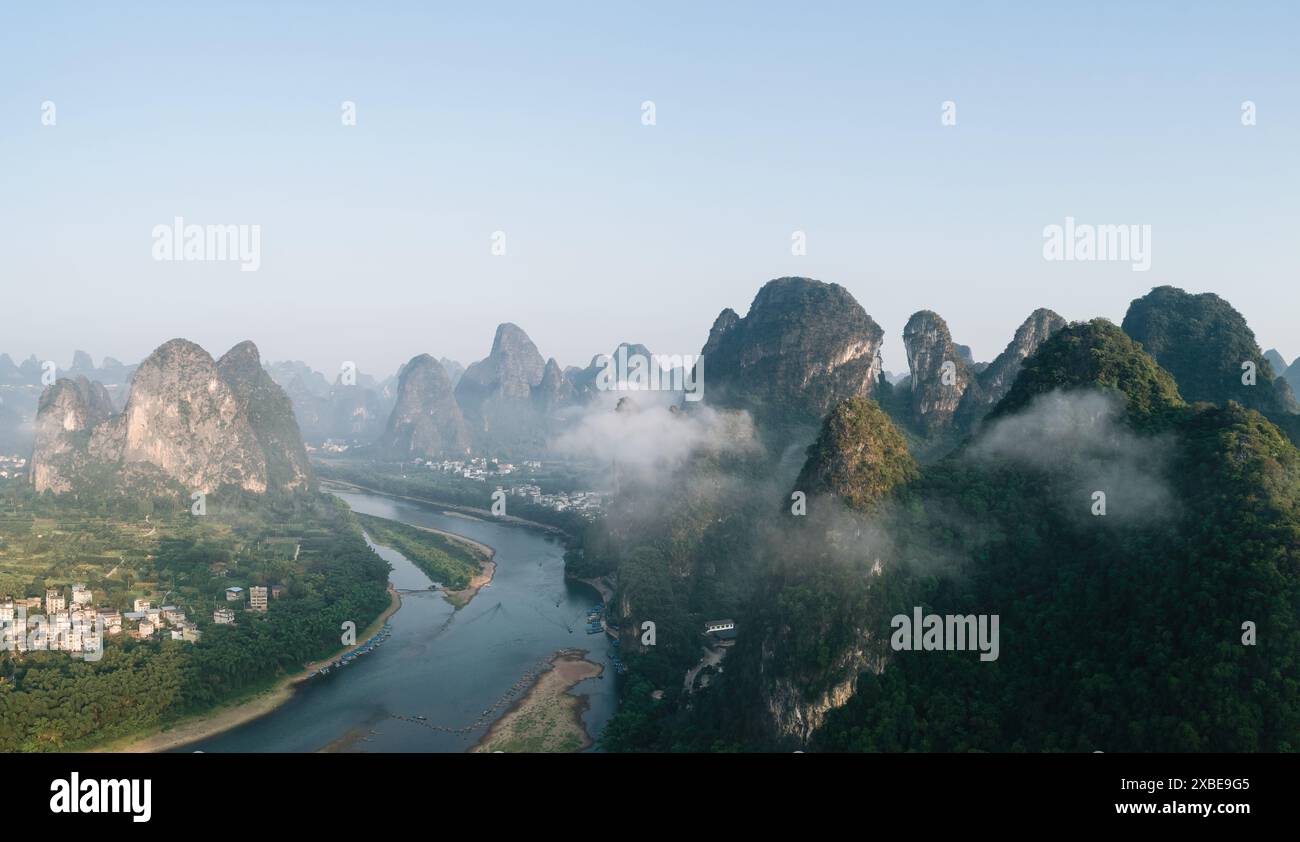 aerial view of Karst mountains with beautiful cloudscape Stock Photo ...
