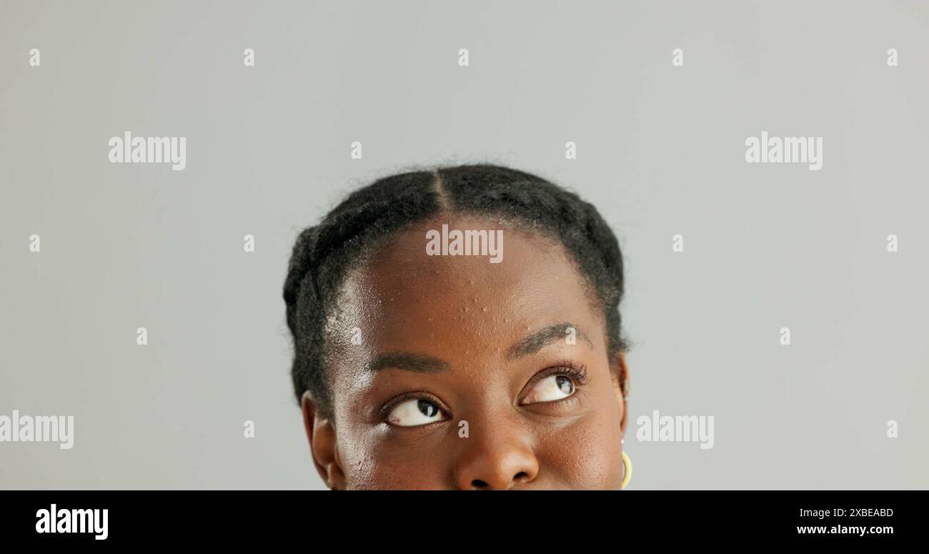 Black woman, eyes and thinking in studio for problem solving or ...