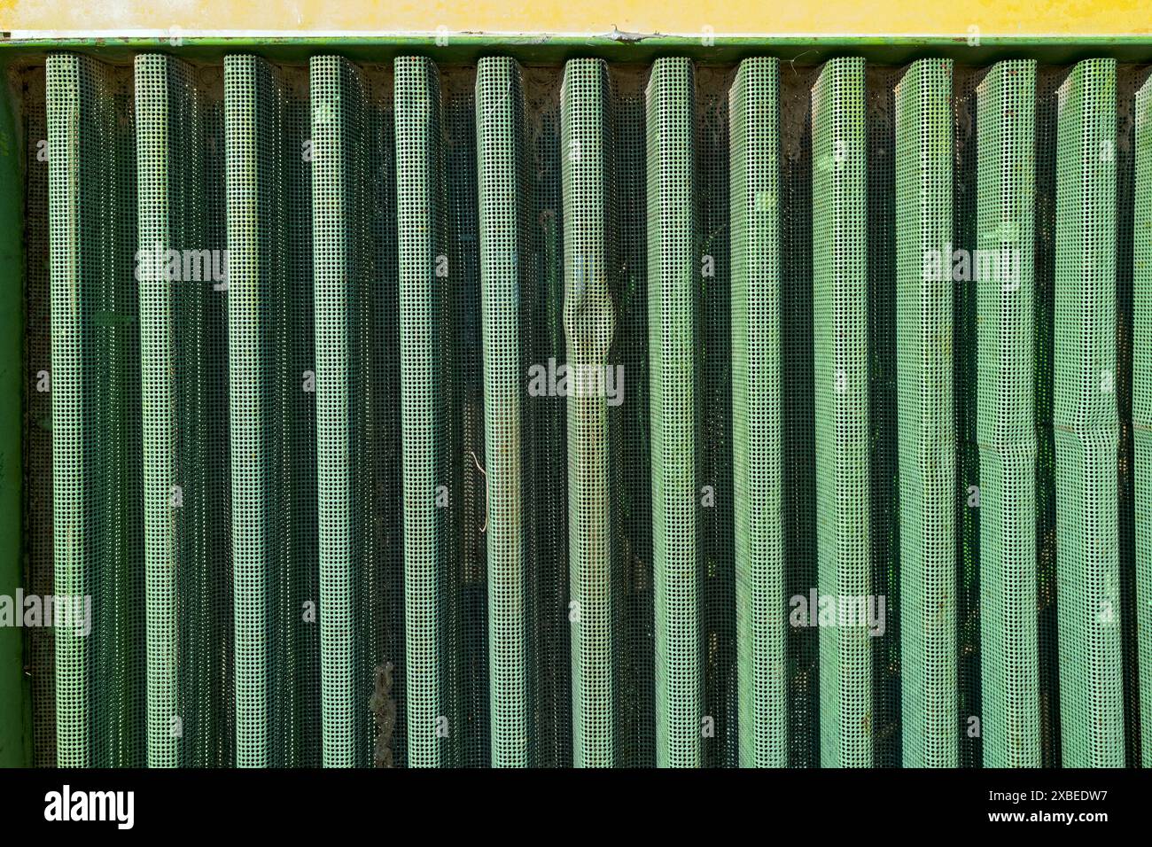 Detail of the perforated side vents for the engine on an antique ...