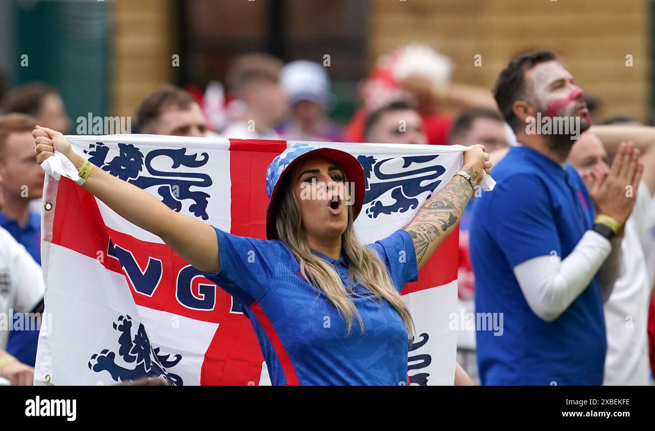 File photo dated 11/07/21 of England fans at the fan zone in Trafford ...