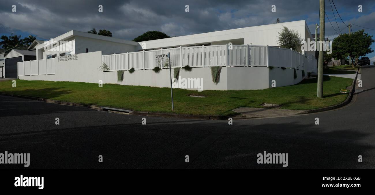 Contemporary, designer house built on a corner block, white building ...