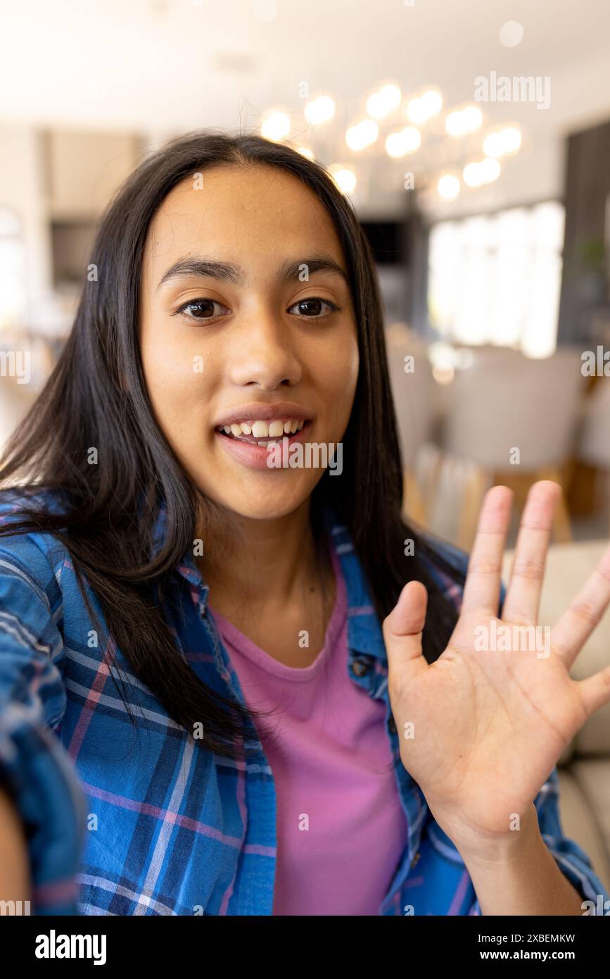 Happy smiling waving hi-res stock photography and images - Alamy