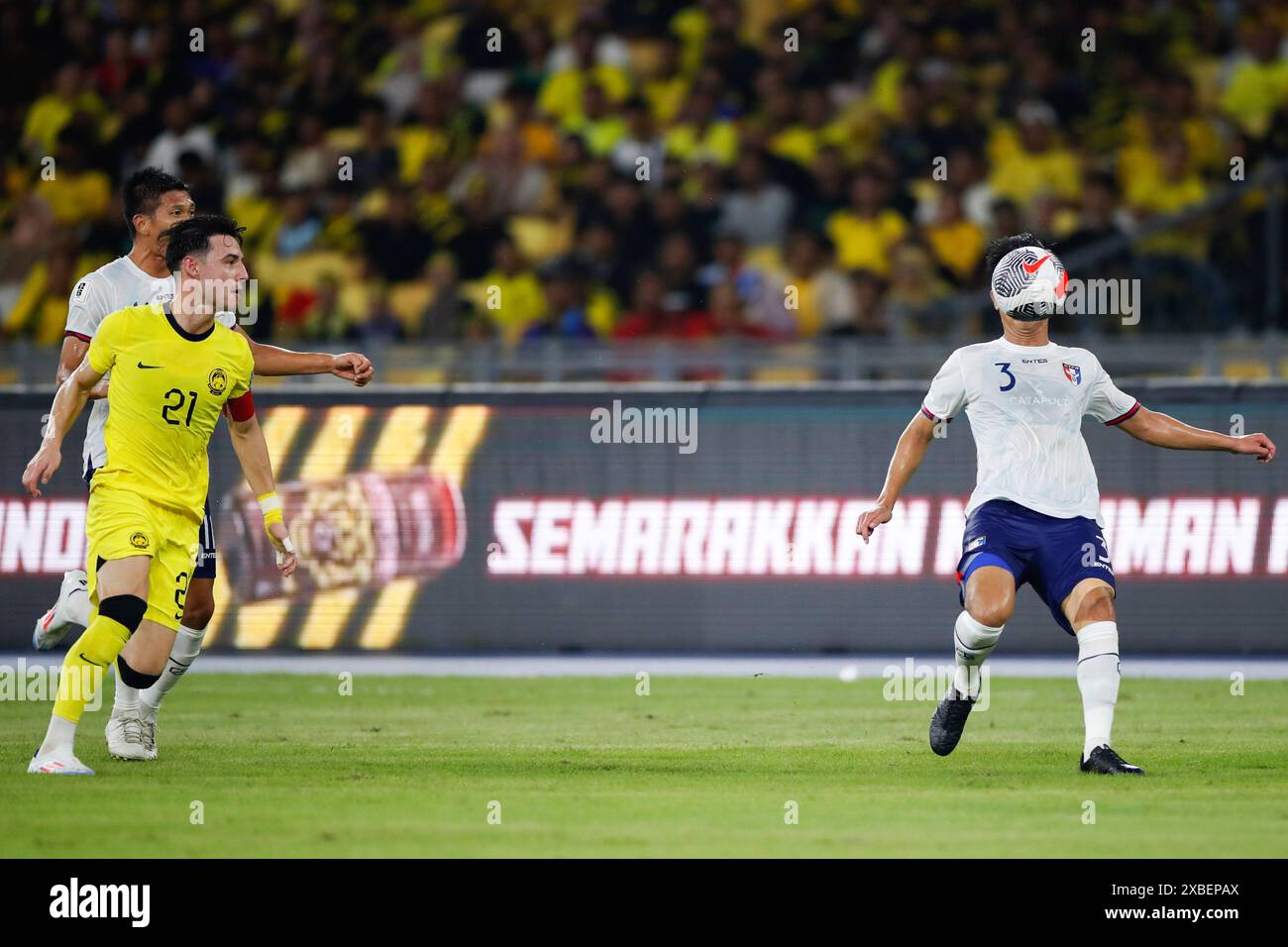 Kuala Lumpur, Malaysia. 11th June, 2024. Dion Cools of Malaysia (L) and Wu Chun Ching (C), Chen ...