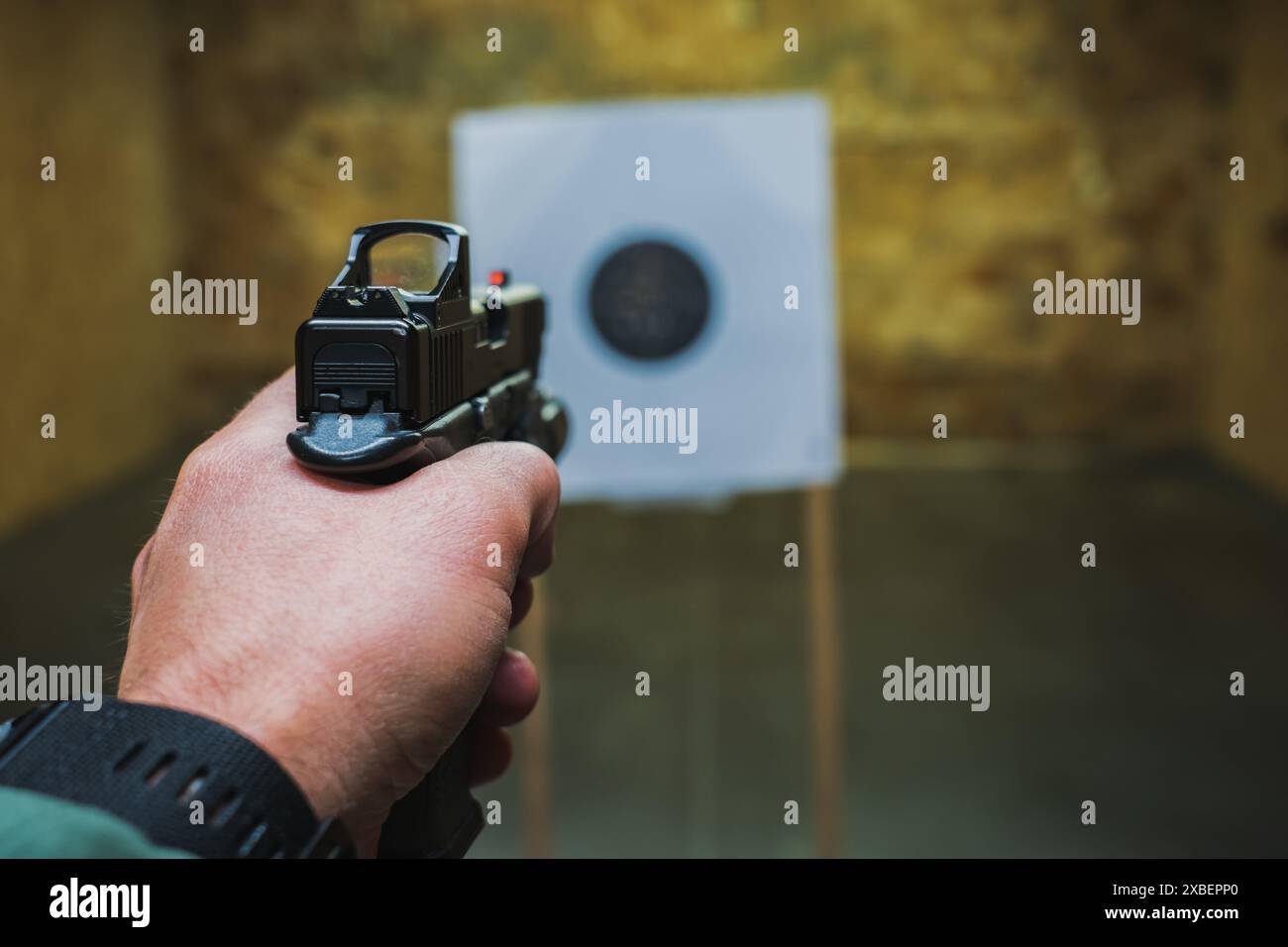 Aiming from modern pistol hi-res stock photography and images - Alamy