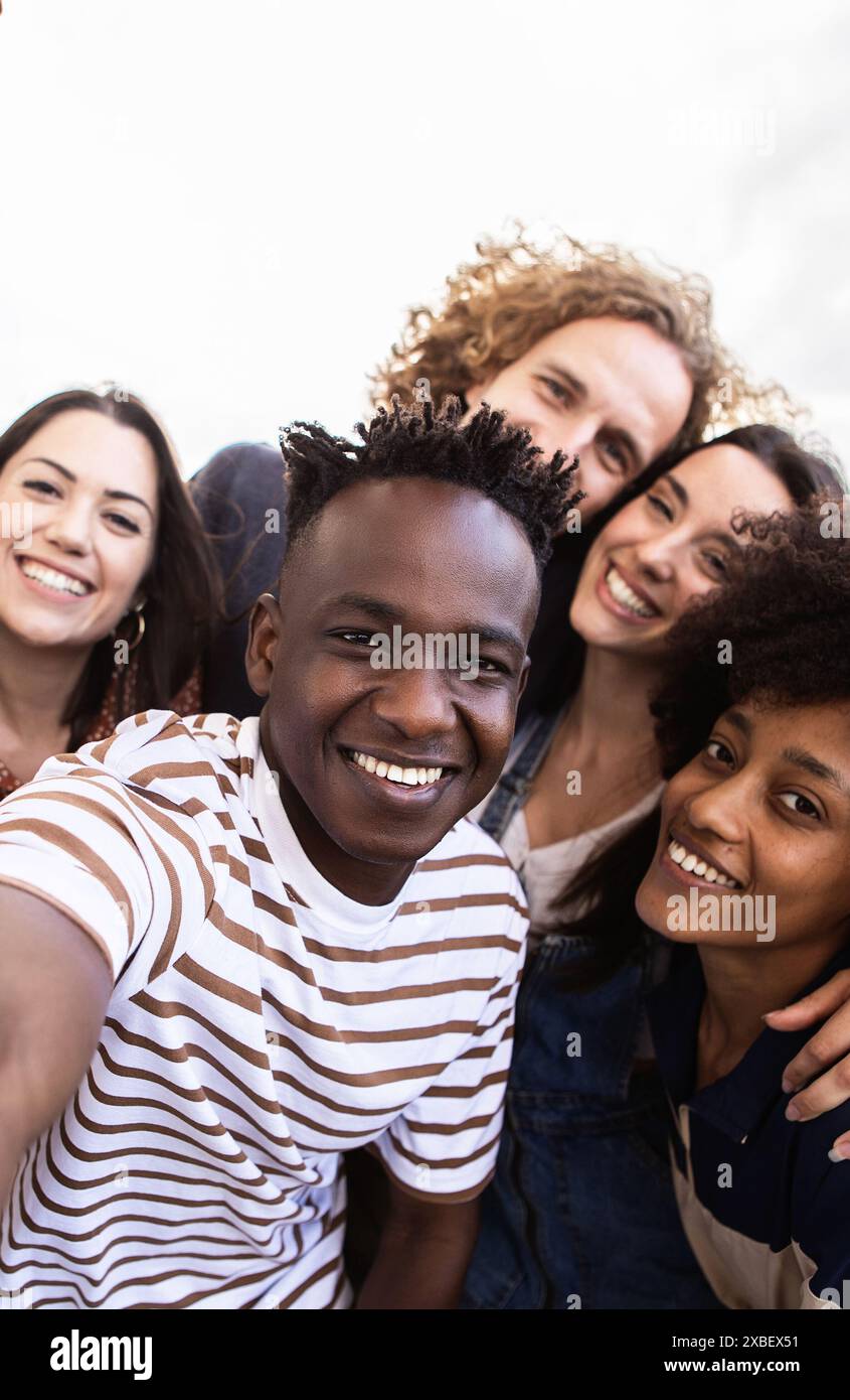Group of happy young people taking selfie portrait together outdoor Stock Photo - Alamy